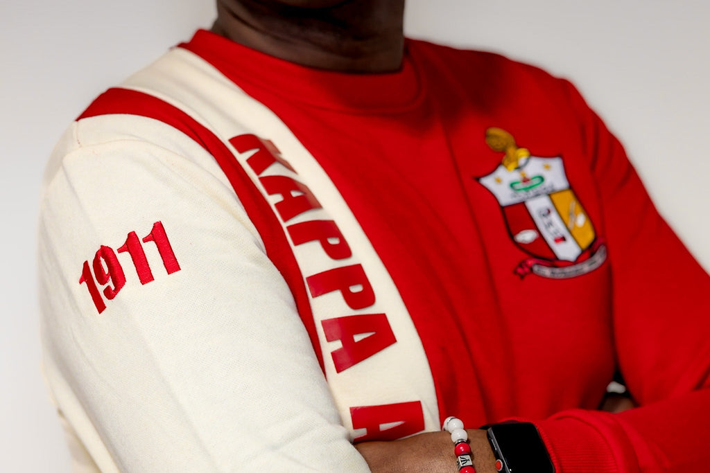 Kappa Alpha Psi Striped Sweater with Shield